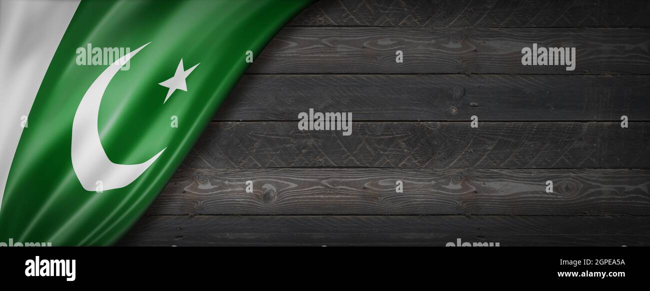 Pakistan flag on black wood wall. Horizontal panoramic banner Stock ...