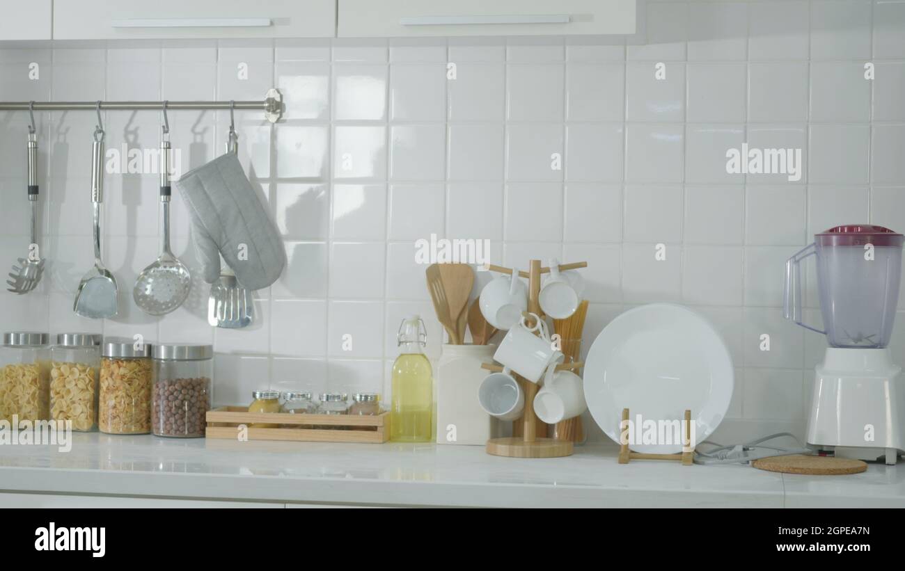 The modern new interior of kitchen with white furniture design luxury ...