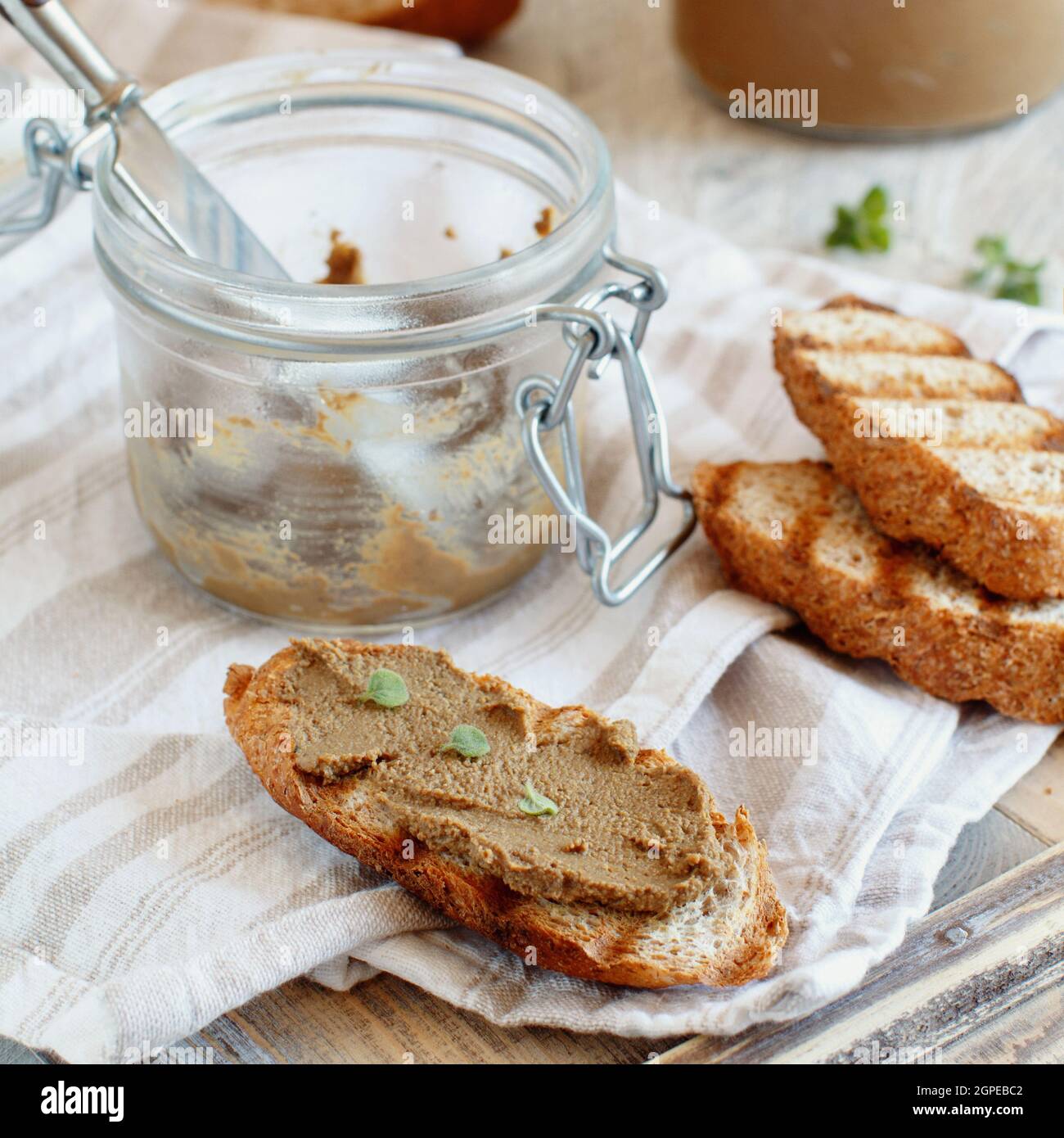 Making sandwiches with homemade pate on a table close up Stock Photo ...