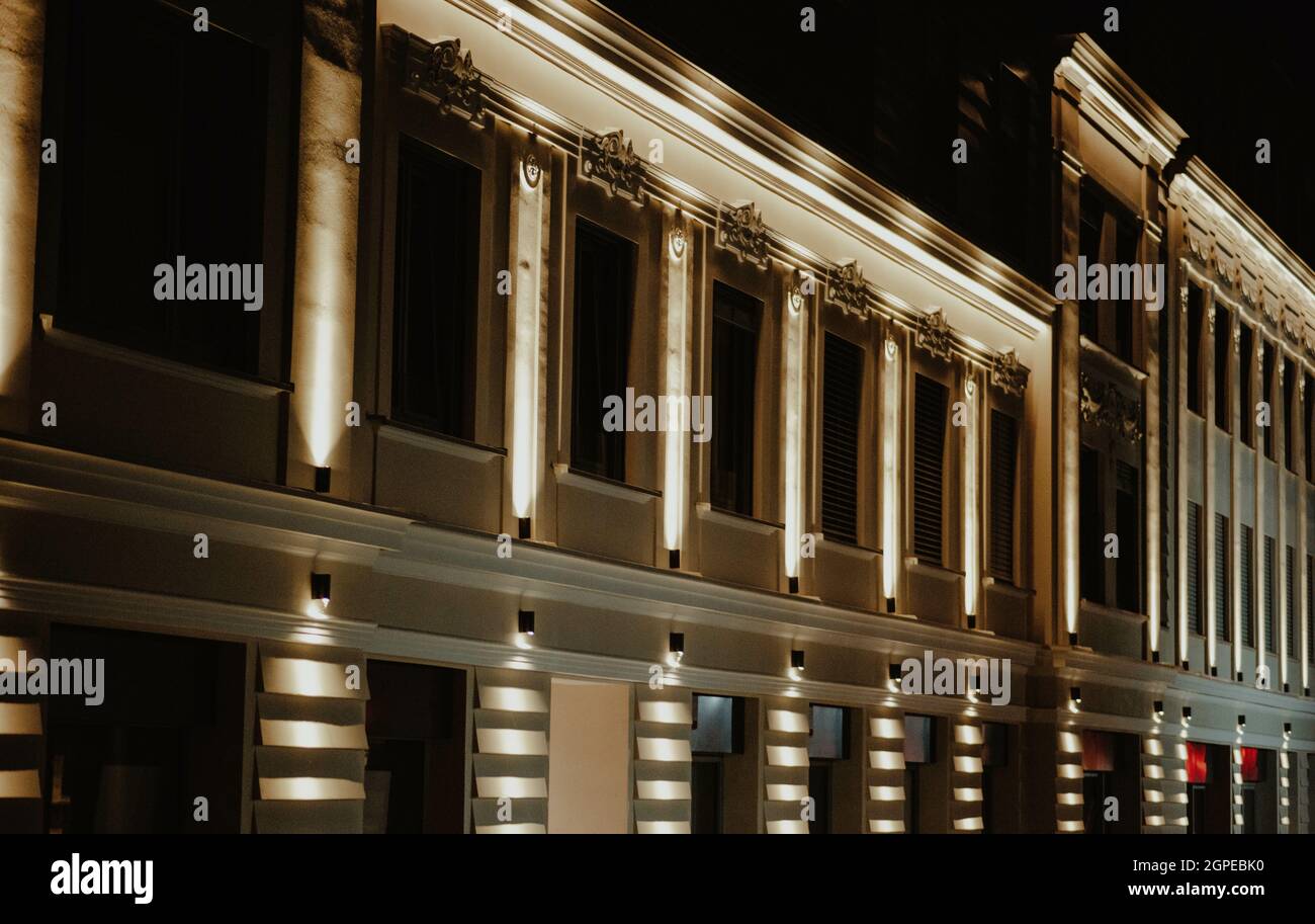 Building with beautiful illumination at night Stock Photo - Alamy