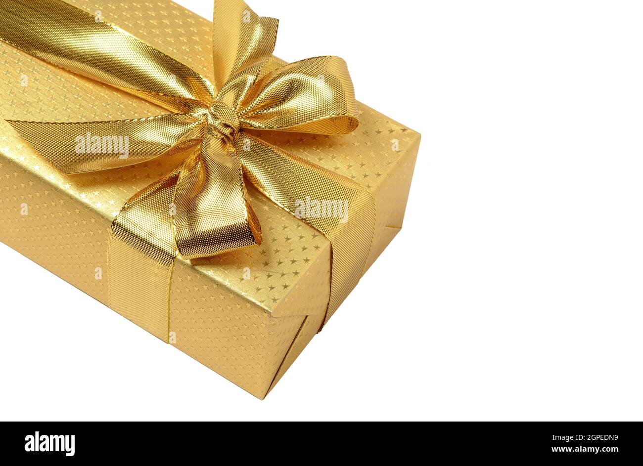 Golden gift box with golden ribbon over white background Stock Photo ...