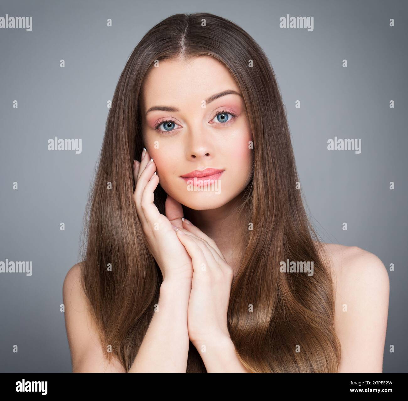 Healthy model woman with long healthy straight brown hair Stock Photo ...