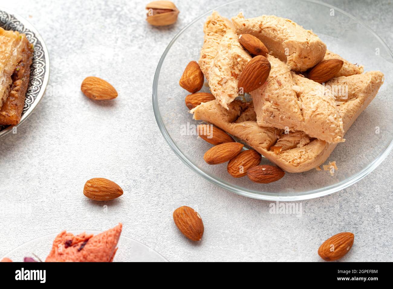 Close up of colorful Turkish halva sweets on gray surface Stock Photo ...