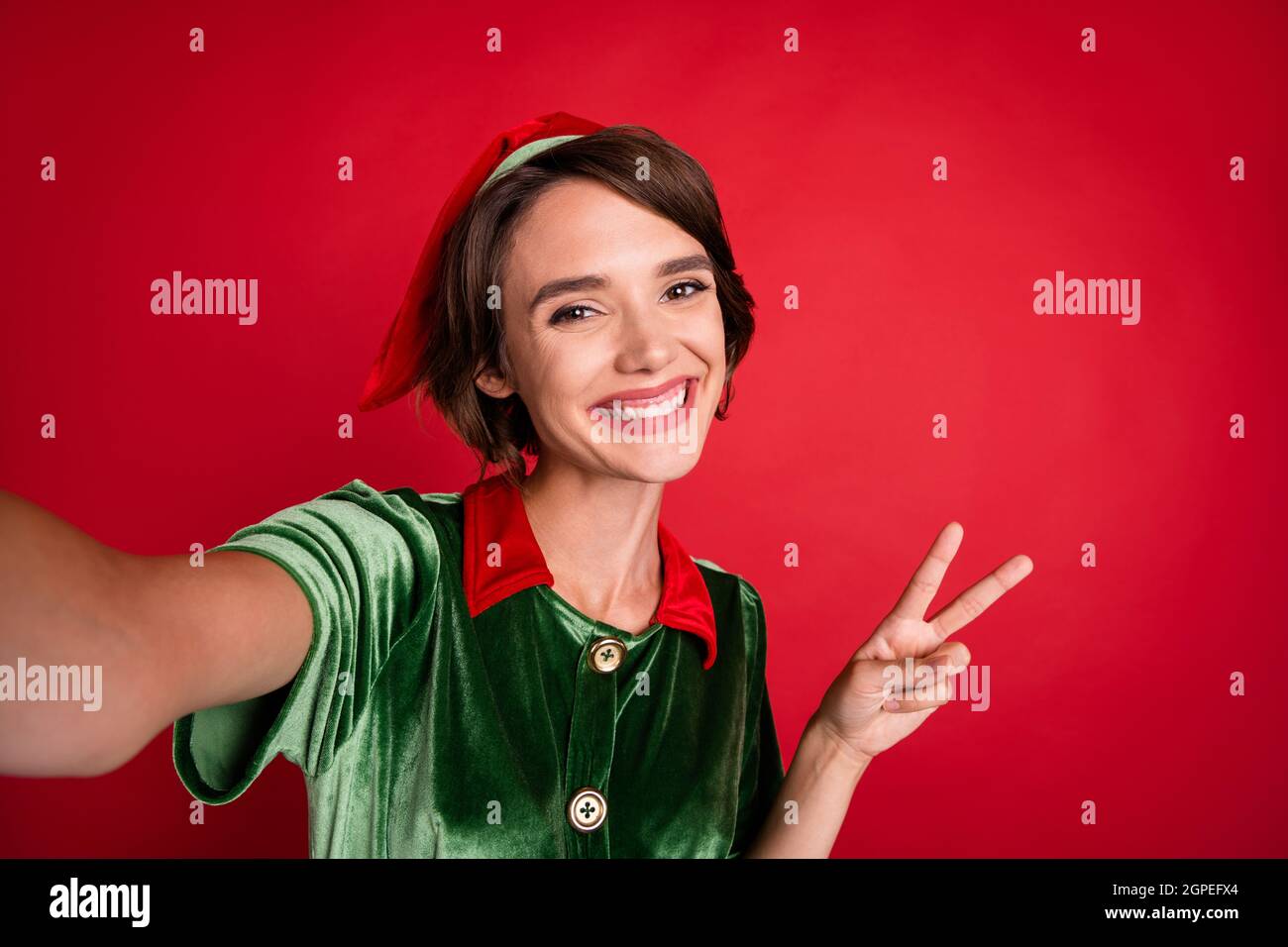 Photo of positive influencer lady show v-sign shoot selfie wear elf ...