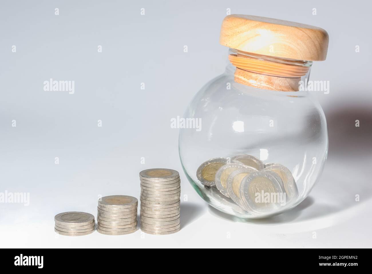The chunk of money on a white background Stock Photo - Alamy