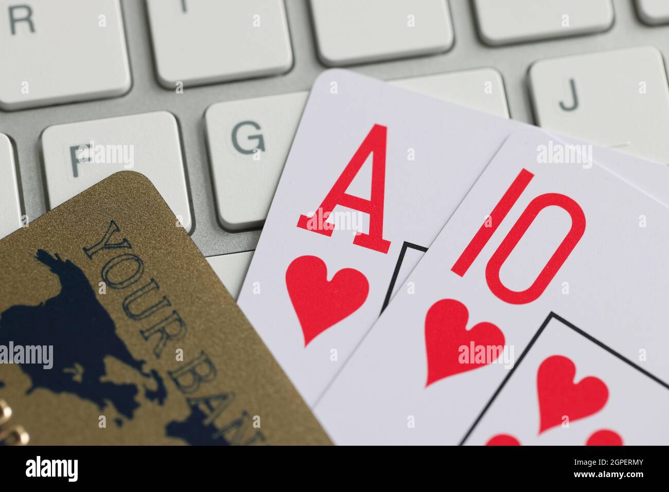 Playing cards bank credit card and computer keyboard on table Stock ...