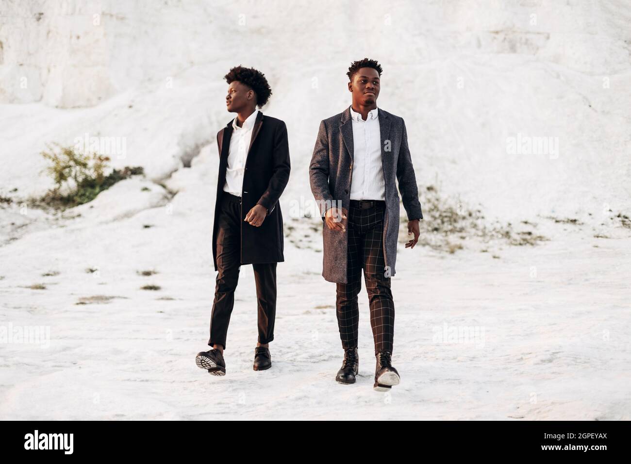 Two men in black suits hi-res stock photography and images - Alamy