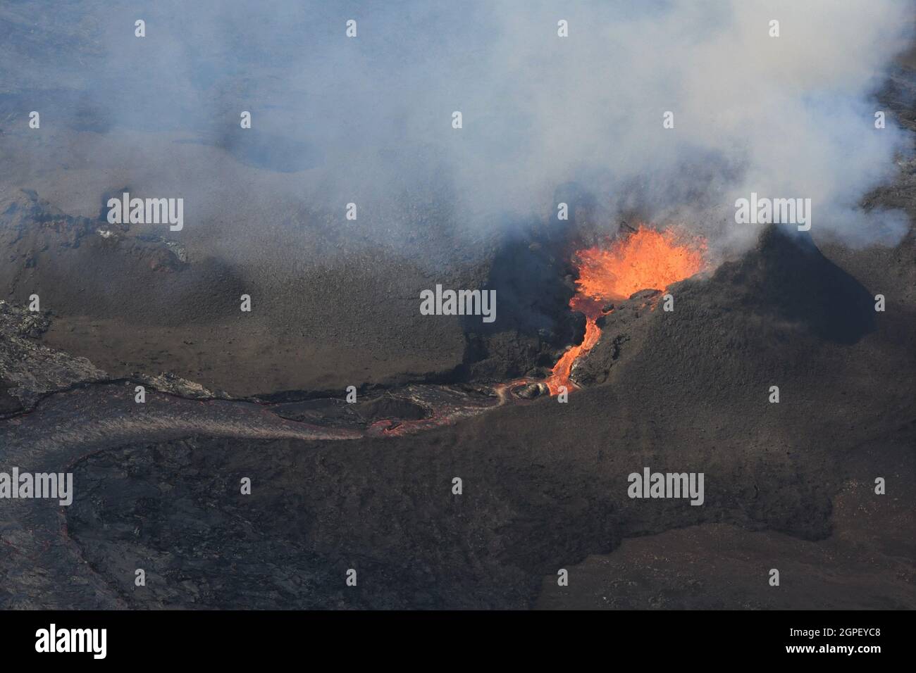 Erupting vent and lava flow at Fagradalsfjall, Iceland. The lava field ...