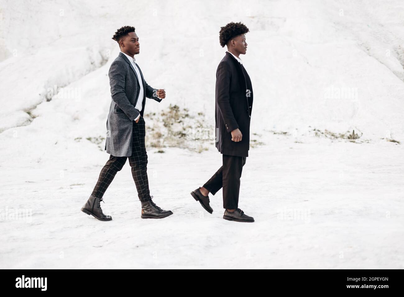 Black men walking hi-res stock photography and images - Alamy