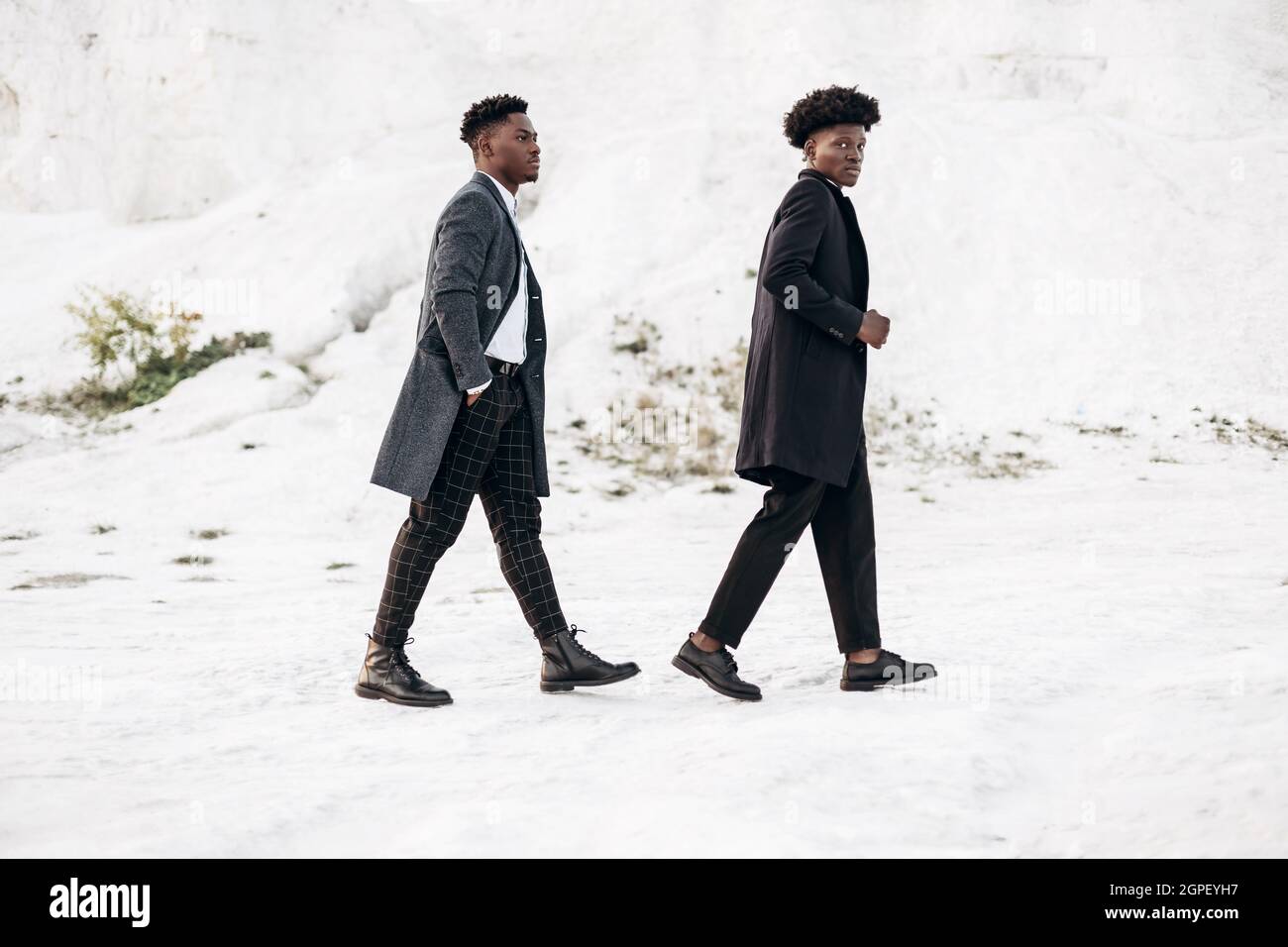 Black men walking hi-res stock photography and images - Alamy