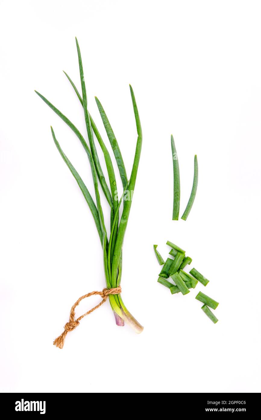 Branch of fresh spring onions and spring onions chops for seasoning ...