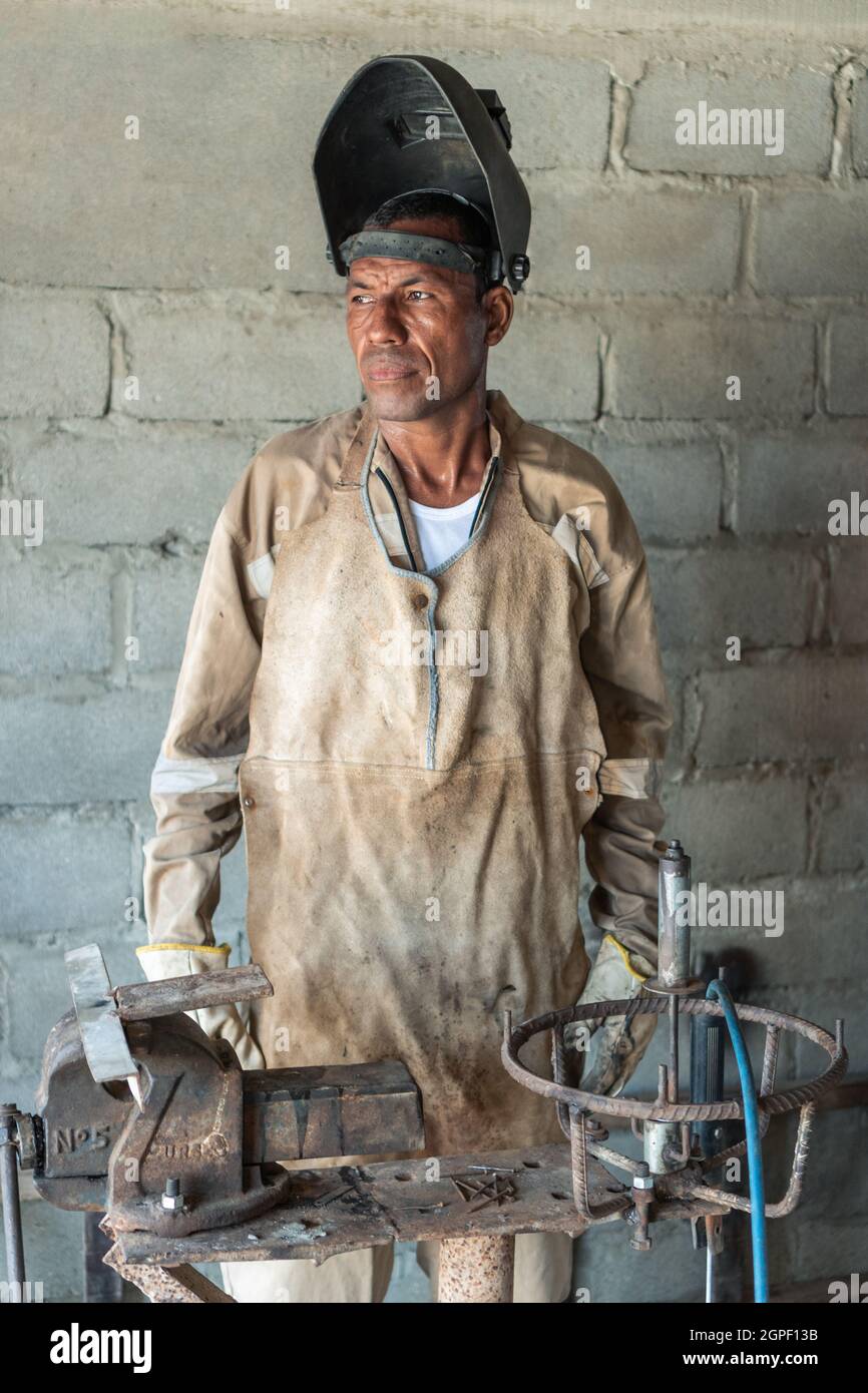 Latin Welder in his work environment Stock Photo - Alamy