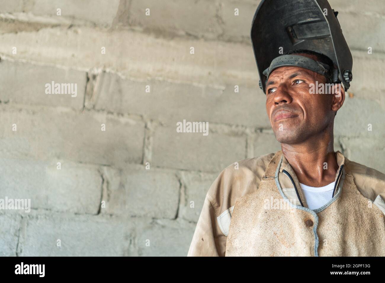 Portrait Of Older Man Working At Workshop Stock Photo - Alamy