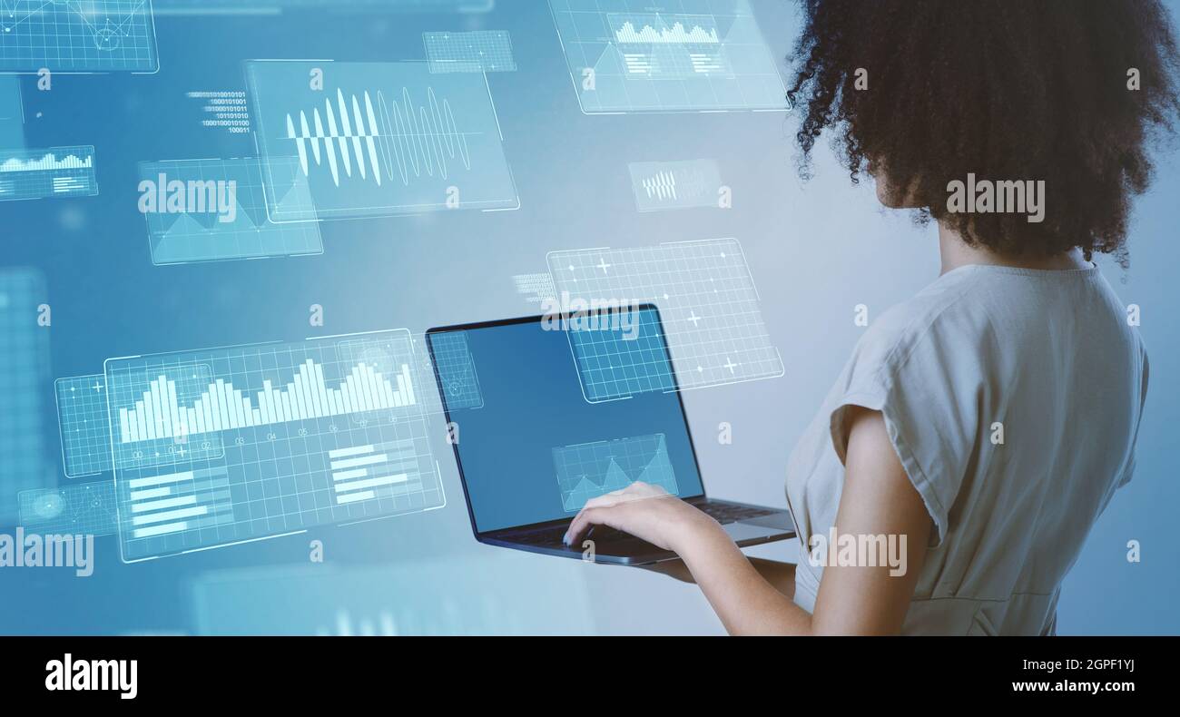 African american woman data analyst typing on laptop Stock Photo - Alamy