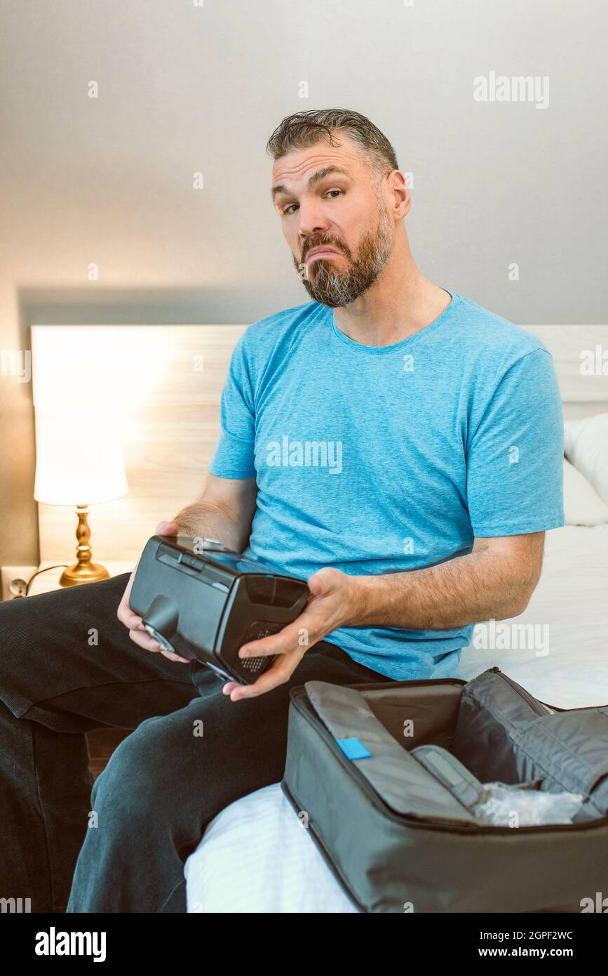 Happy rested man with chronic breathing issues after using CPAP machine ...