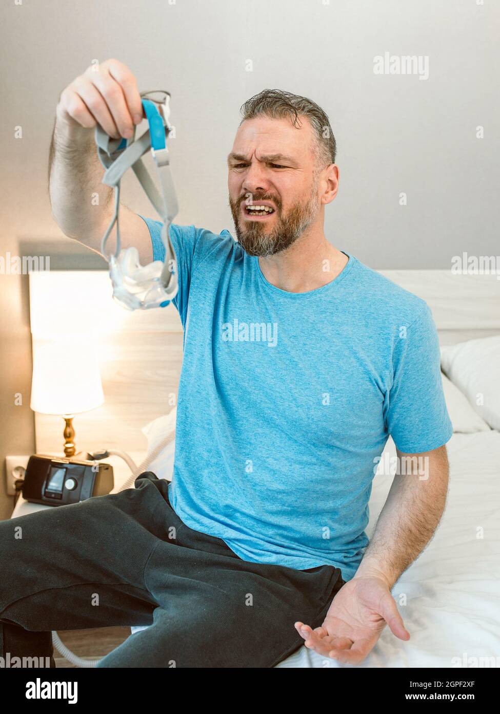 Unhappy shocked man with chronic breathing issues surprised by using ...