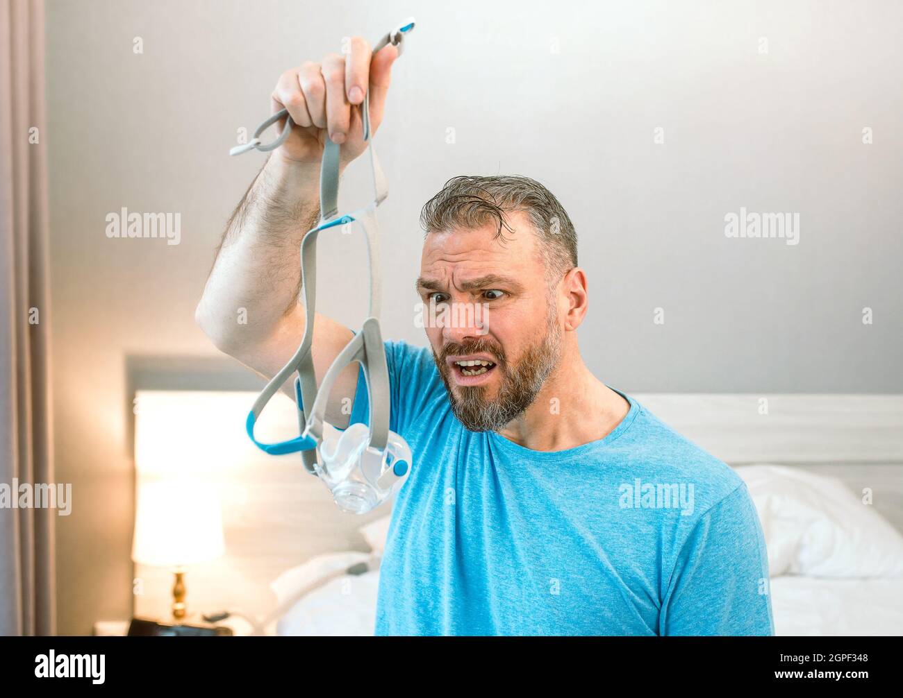 Unhappy shocked man with chronic breathing issues surprised by using ...