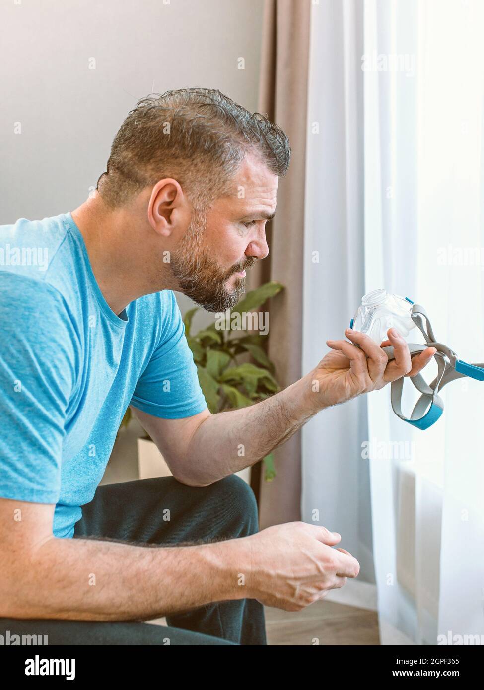 Unhappy shocked man with chronic breathing issues surprised by using ...