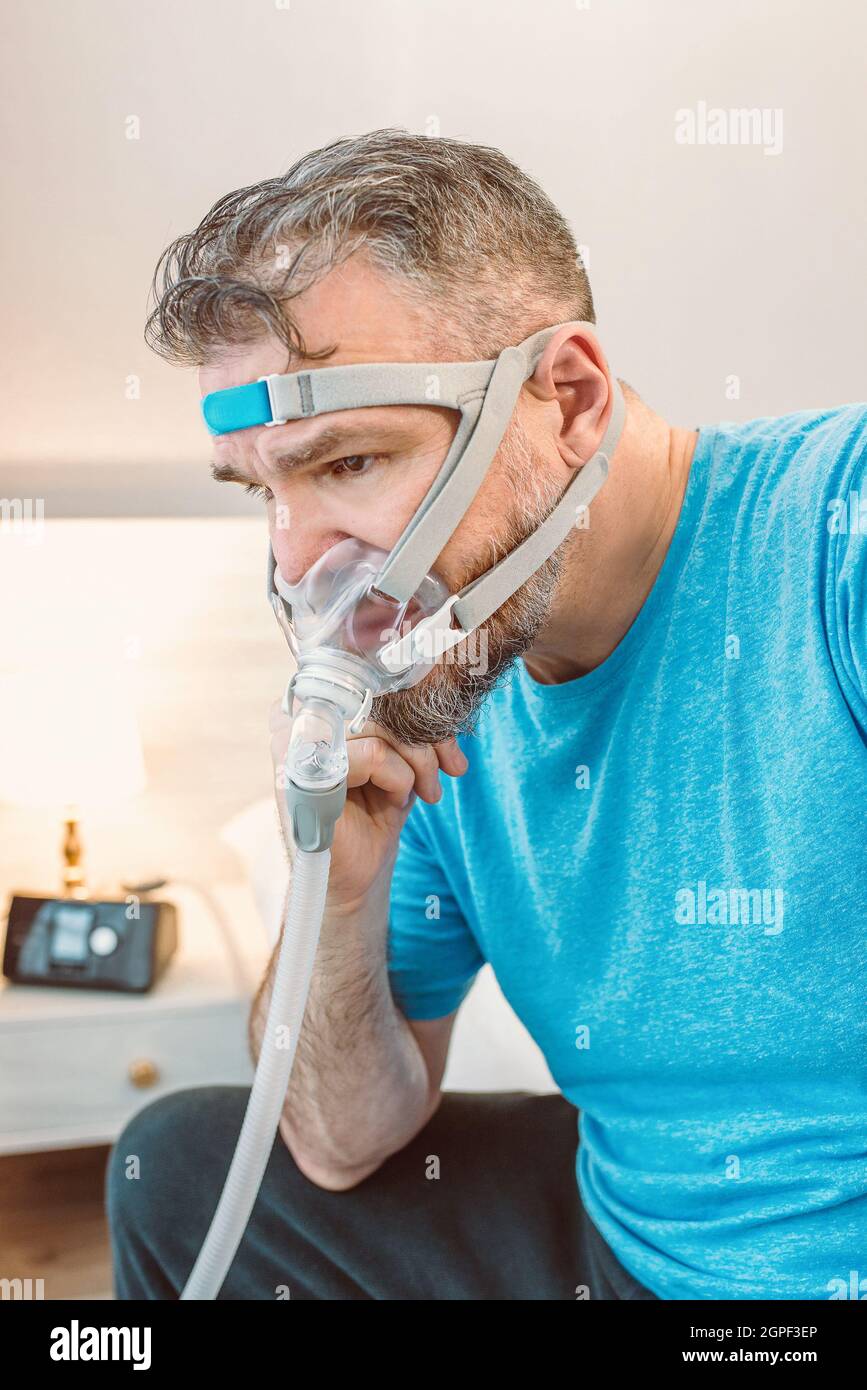 Unhappy shocked man with chronic breathing issues surprised by using ...