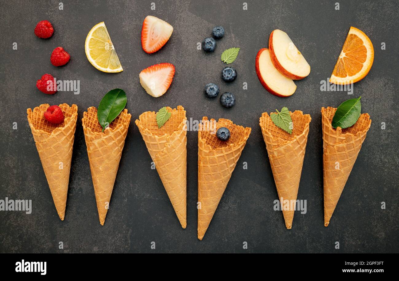 Various of fruits in cones blueberry ,strawberry ,raspberries and ...