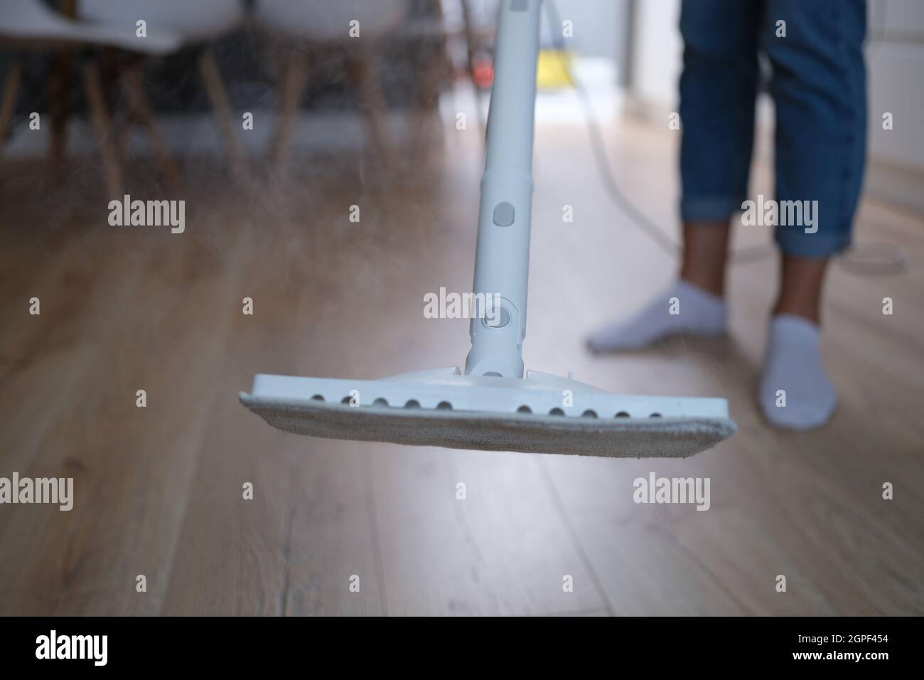 Using steam mop hi-res stock photography and images - Alamy