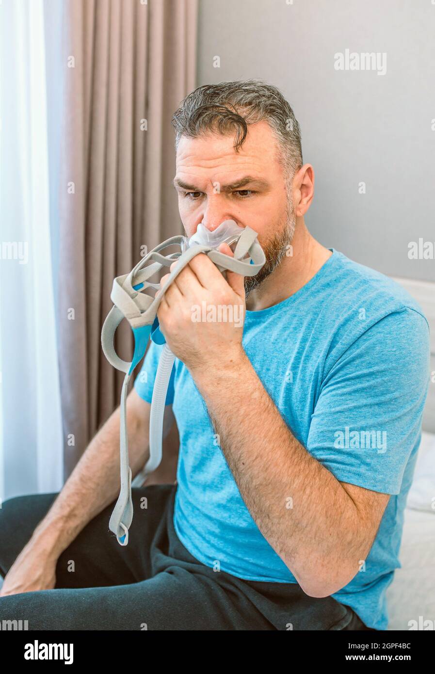 Unhappy shocked man with chronic breathing issues surprised by using ...