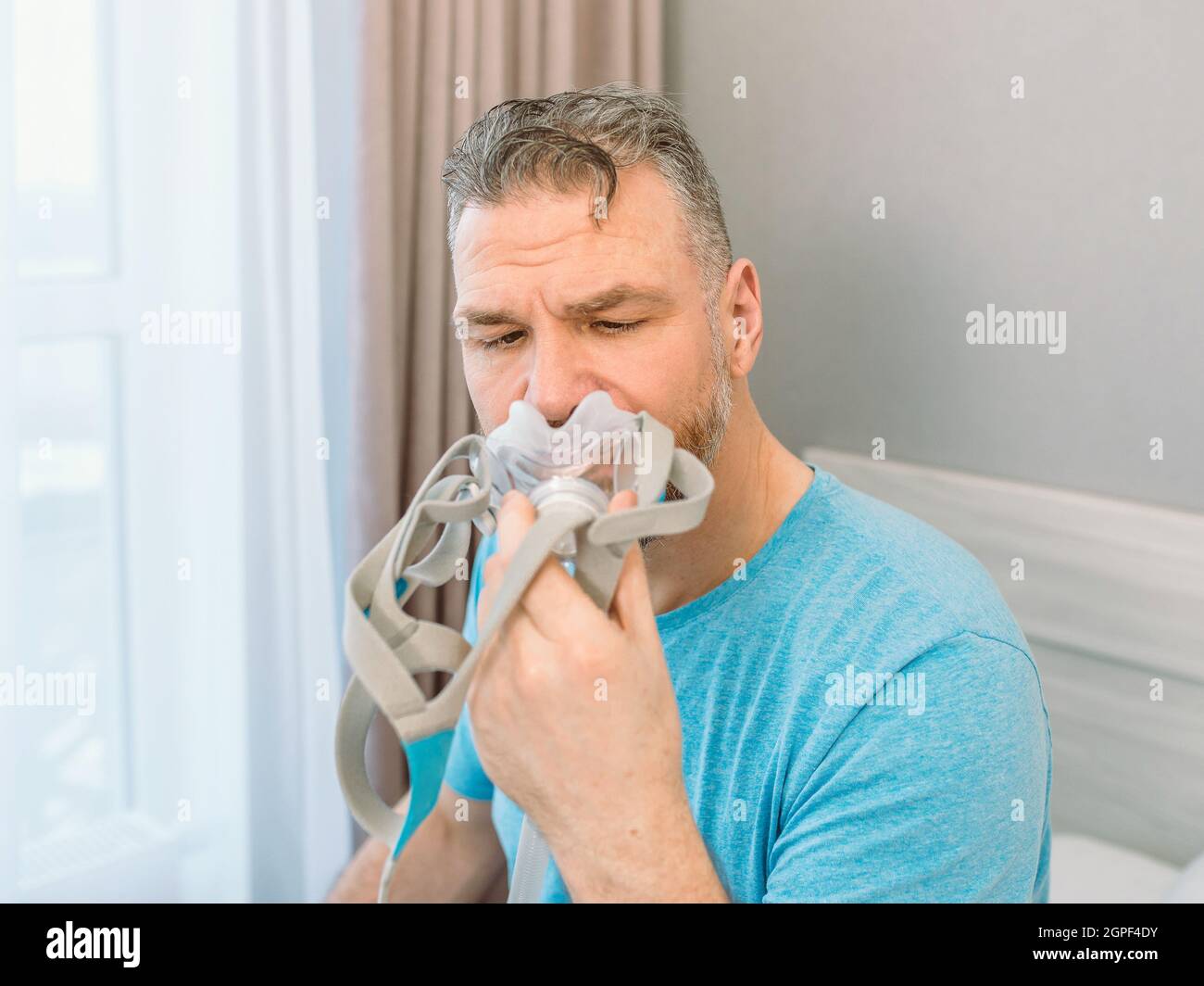 Unhappy shocked man with chronic breathing issues surprised by using ...