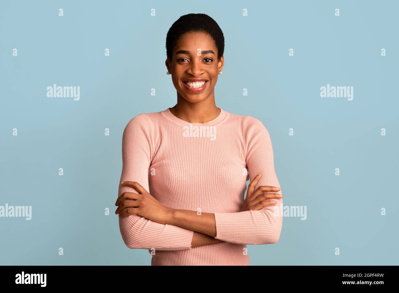 Smiling confident lady standing hi-res stock photography and images - Alamy