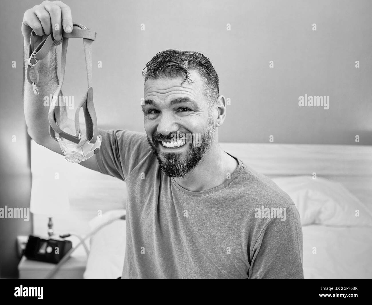 monochrome portrait of Happy rested man with chronic breathing issues ...