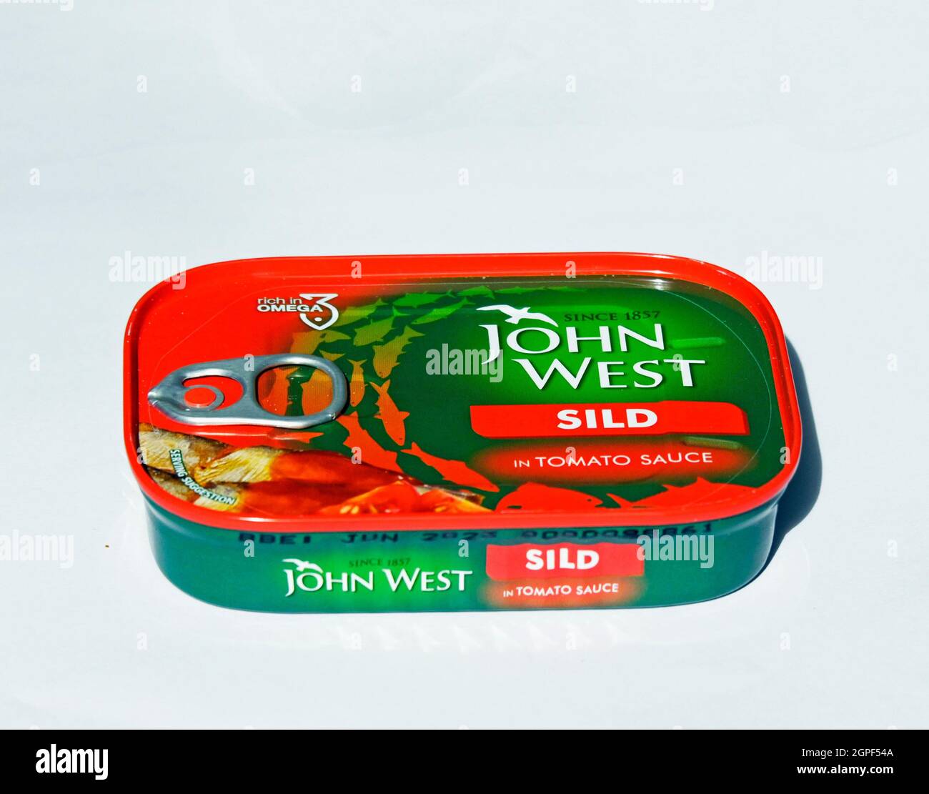 Tin of John West Sild in Tomato Sauce. Rich in Omega 3 Stock Photo - Alamy