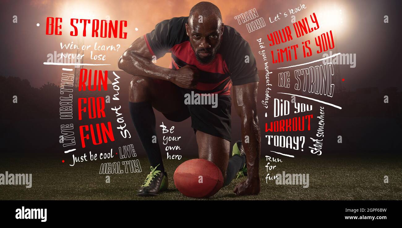 Professional male rugby player posing isolated on stadium background ...