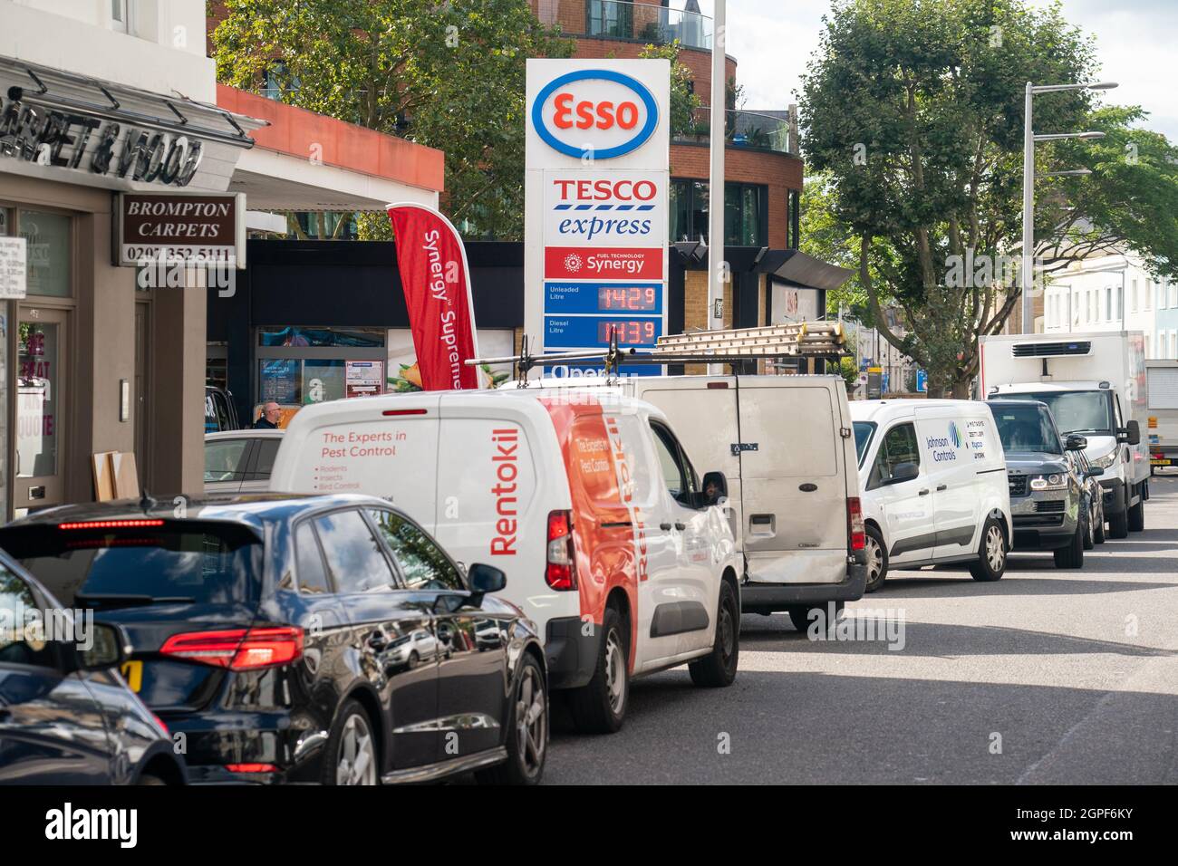 Vehicles queue for fuel at a petrol station in west London. Picture ...