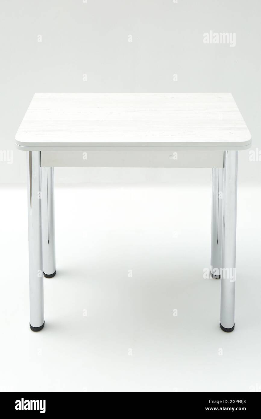 Classic wooden white kitchen table on white background Stock Photo - Alamy