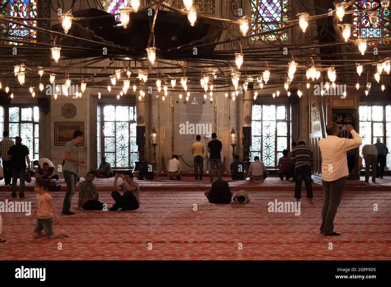 Istanbul, Turkey; May 25th 2013: Muslims praying in the Blue Mosque ...
