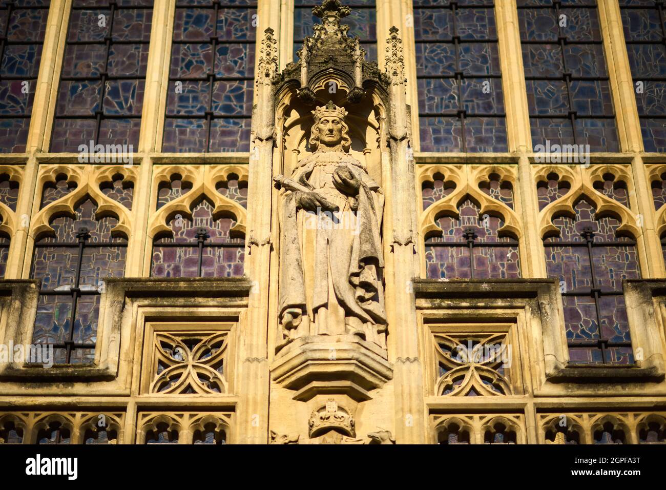 Statue on the front of Bath Abbey Stock Photo - Alamy