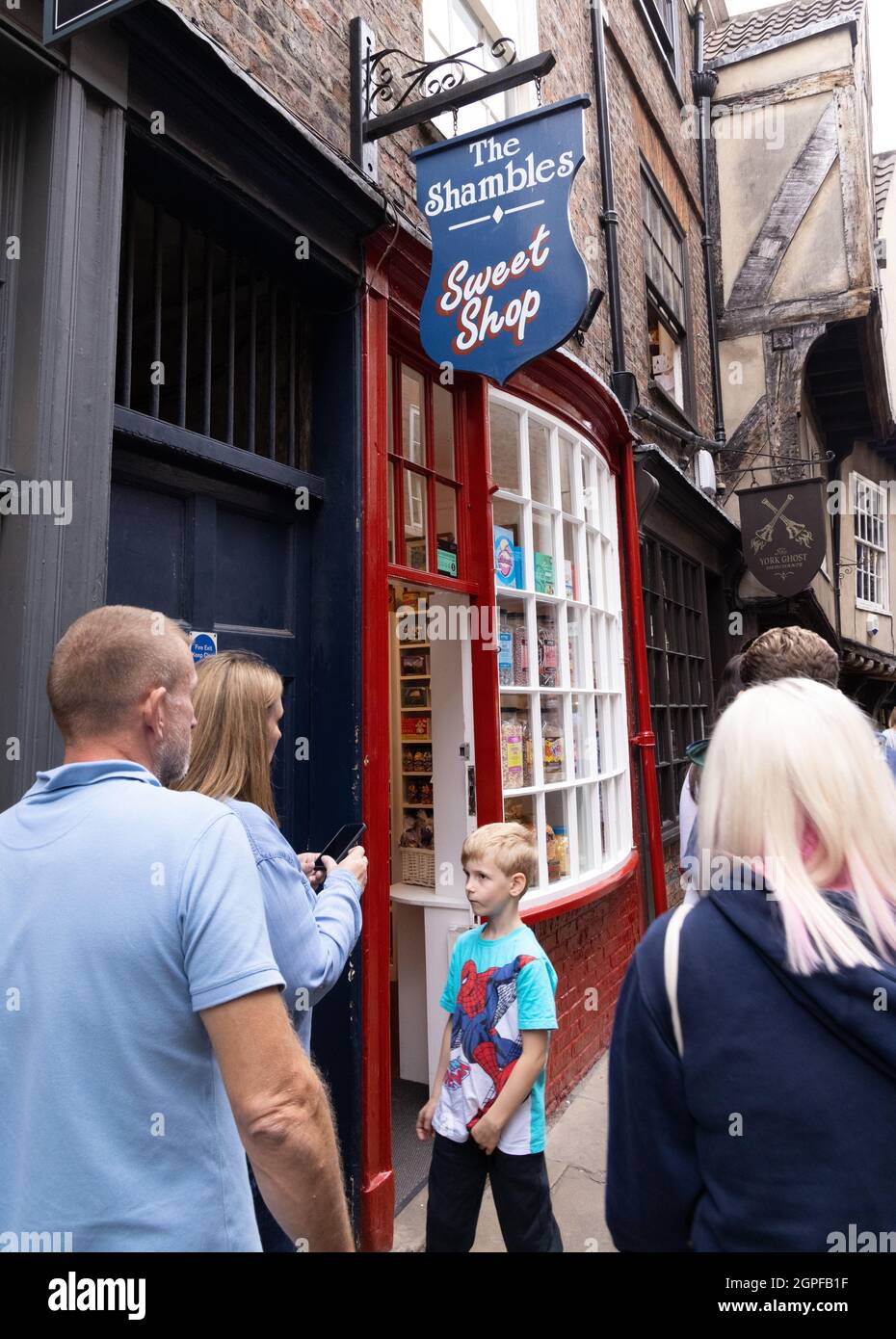 People with children at The Shambles Sweet Shop, The Shambles, York UK ...