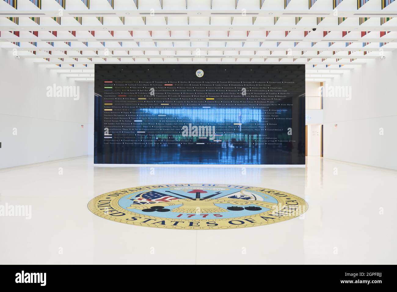 The front entrance lobby with inlaid seal, crest, symbol. At the ...