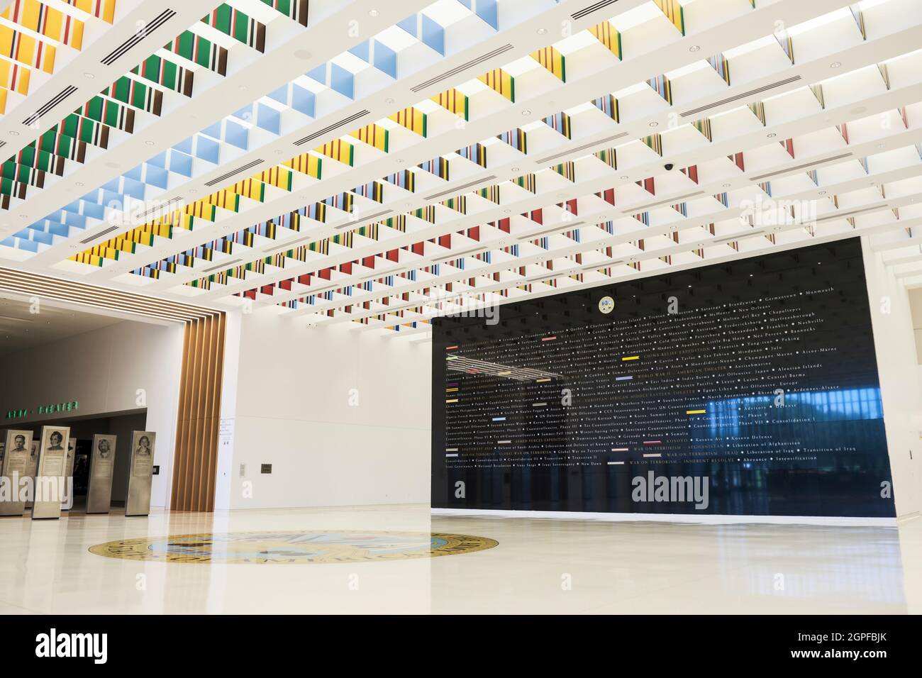 The front entrance lobby with inlaid seal, crest, symbol. At the ...