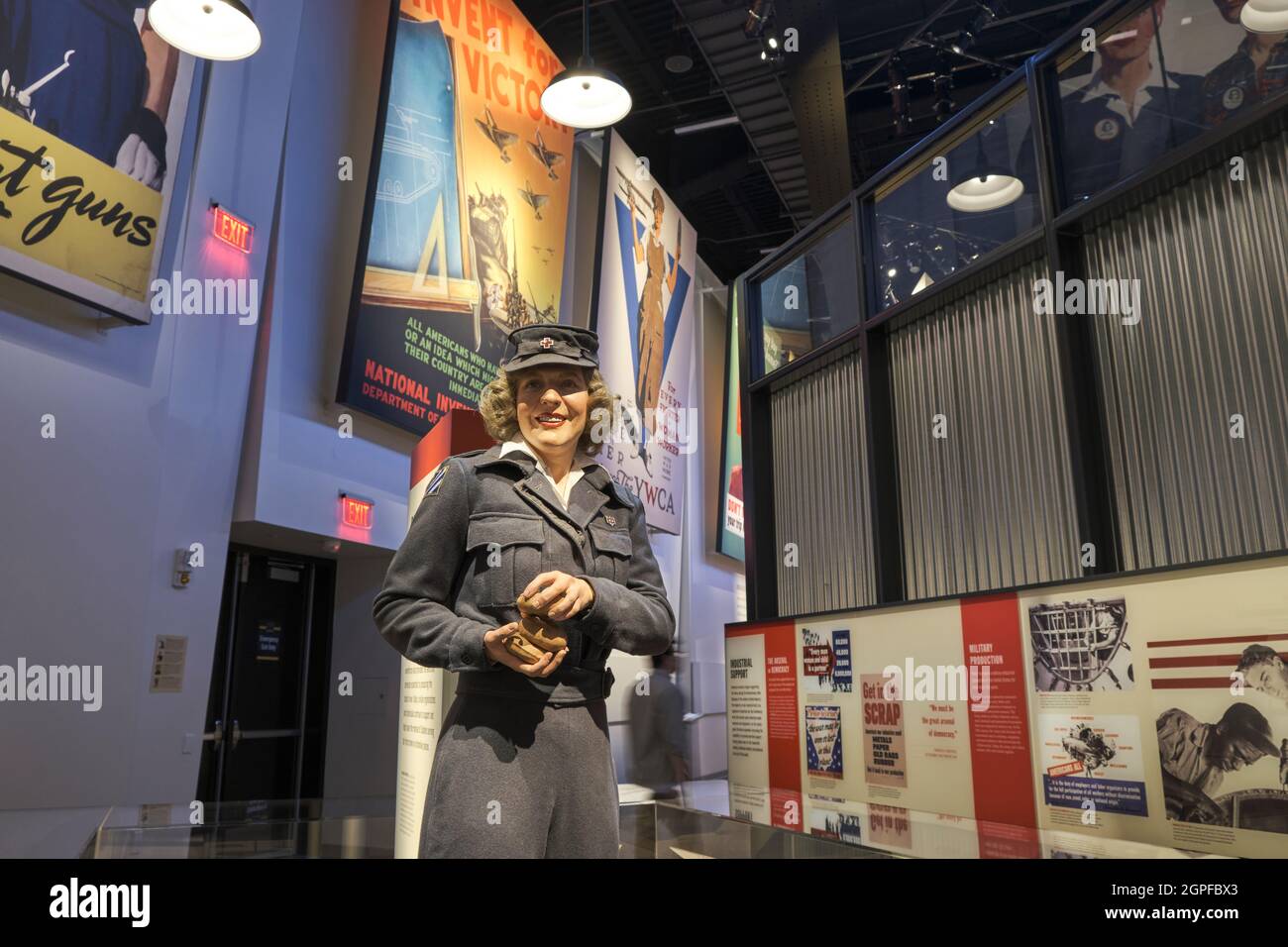 A woman in the Army with small packet supply handouts. At the National ...