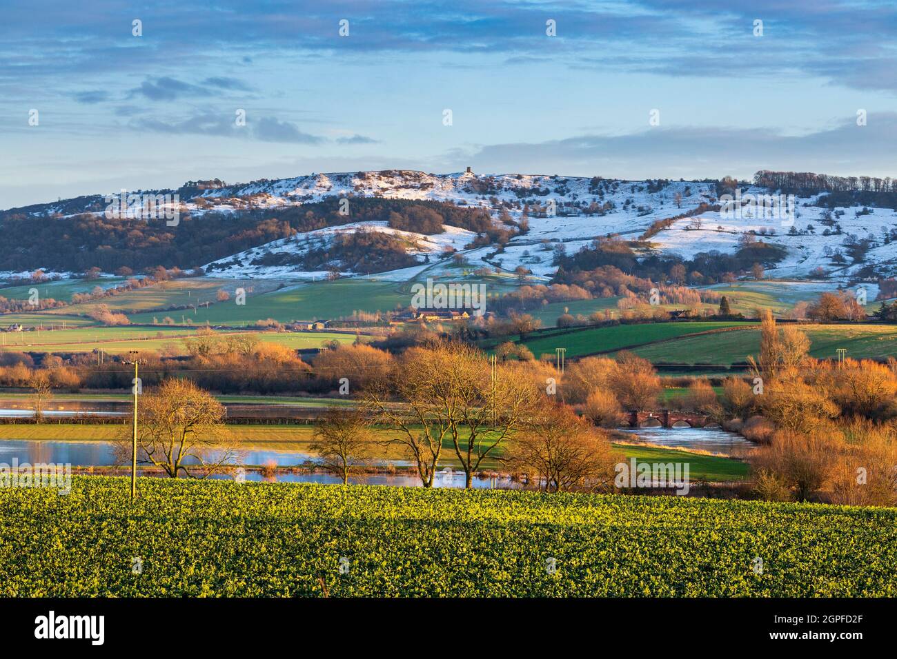 A late winter's afternoon view of Bredon hill and Eckington bridge ...