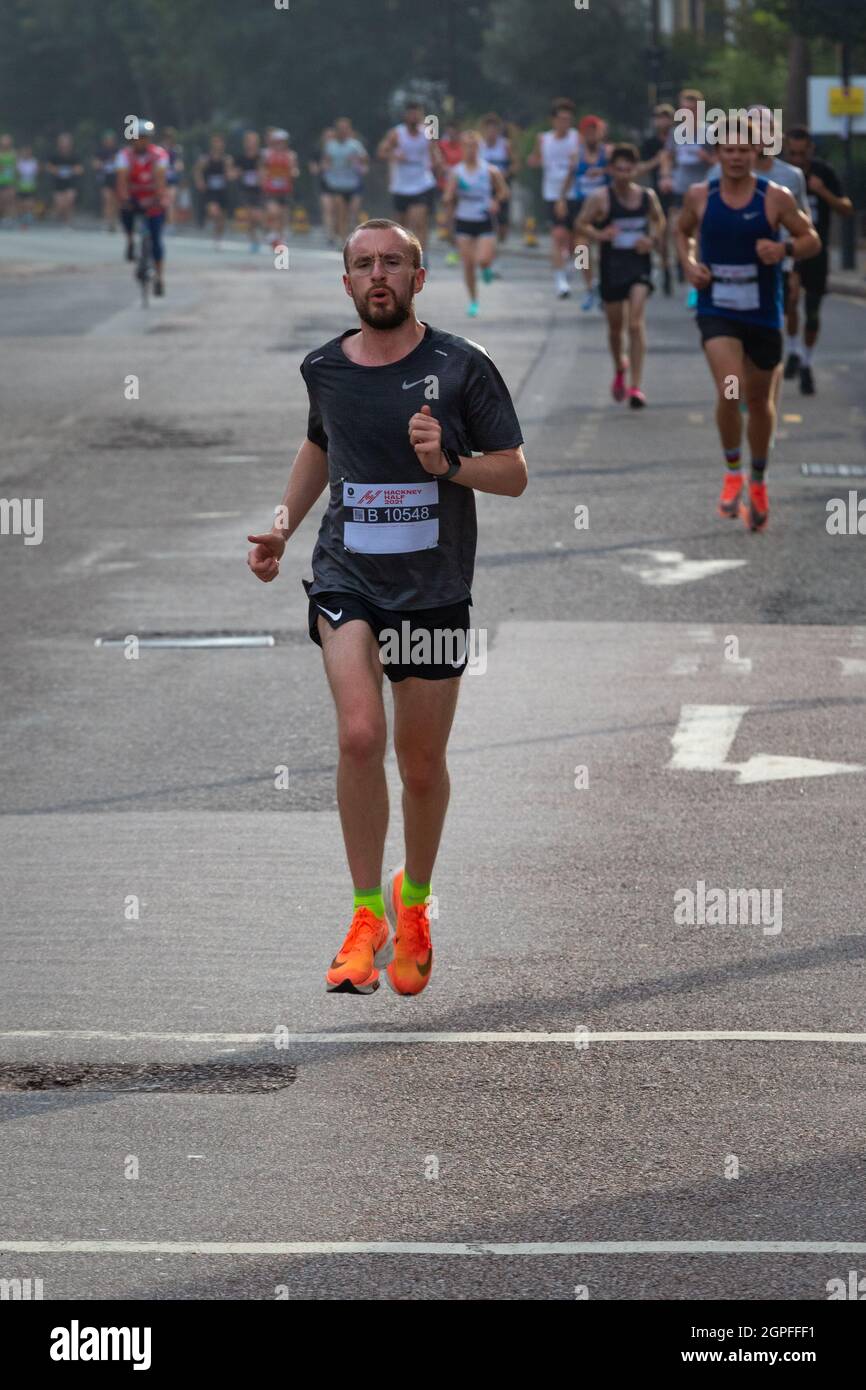 Runners in the Hackney Half 2021, a half marathon though the streets of ...