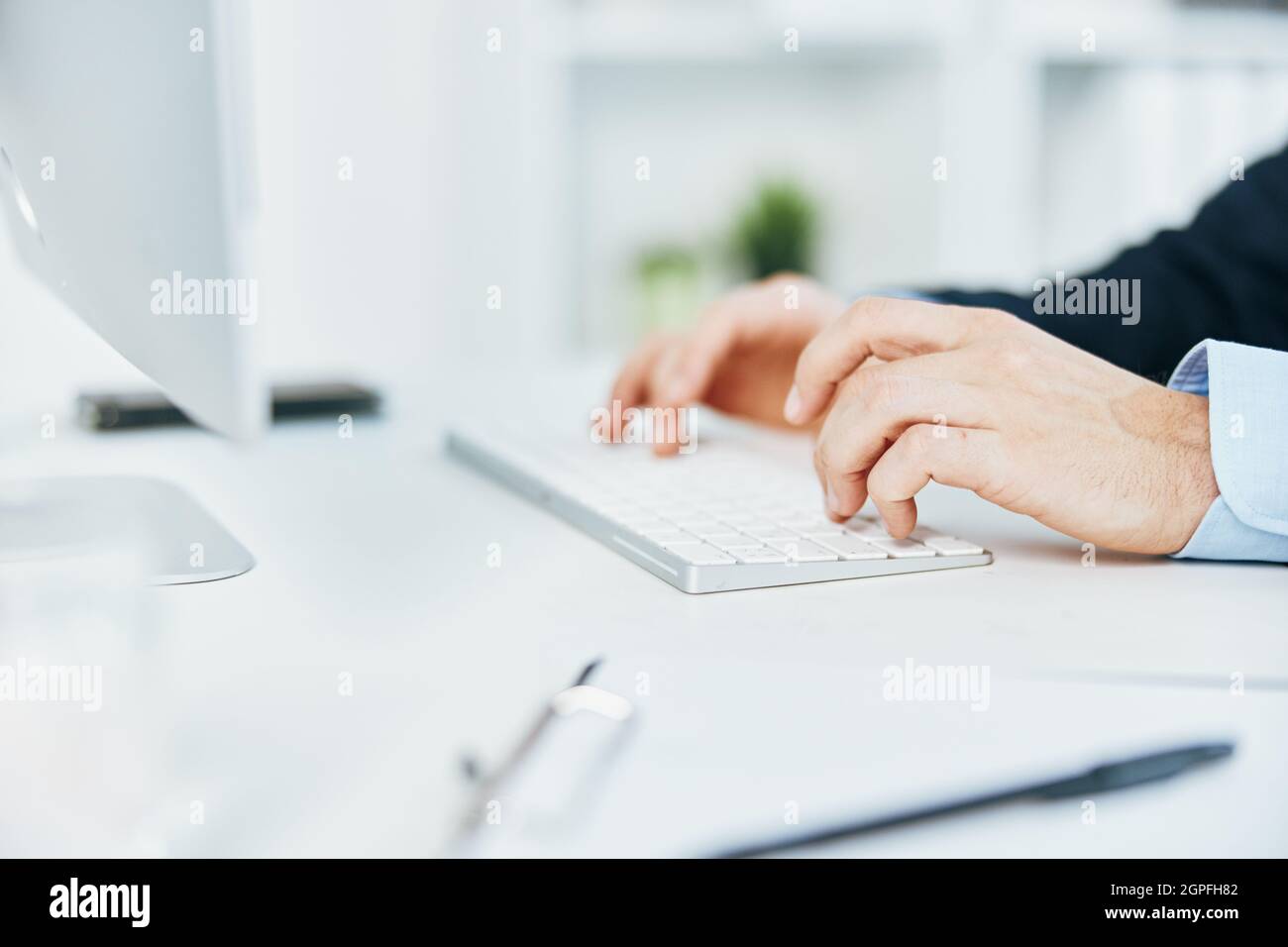 Desktop computer keyboard typing documents office Stock Photo - Alamy