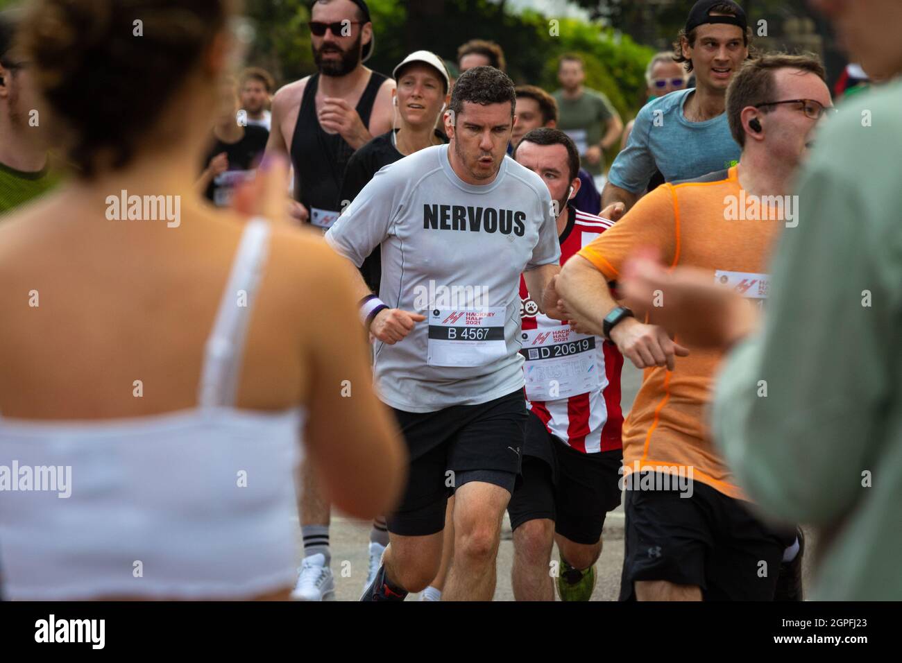 Runners in the Hackney Half 2021, a half marathon though the streets of ...