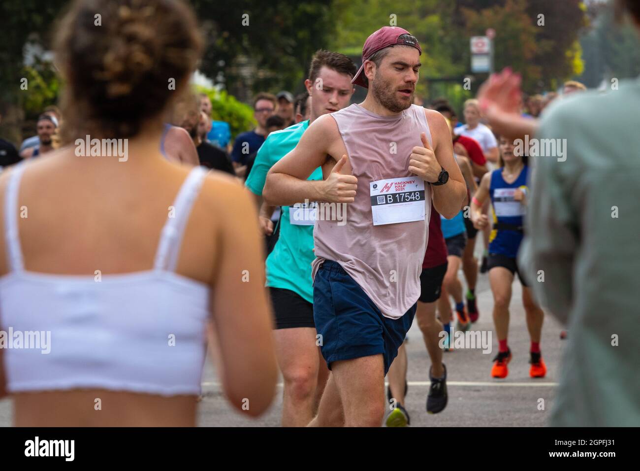 Runners in the Hackney Half 2021, a half marathon though the streets of ...