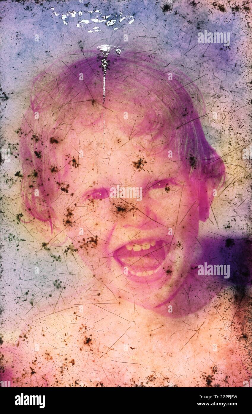 Austin Texas USA, 1998: Two-year old baby boy outside at home, showing ...