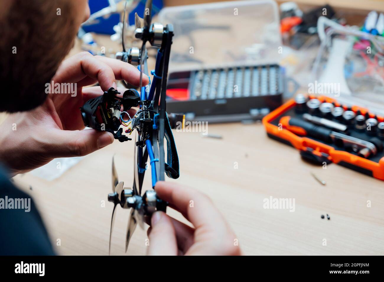 Man repairs device hi-res stock photography and images - Alamy