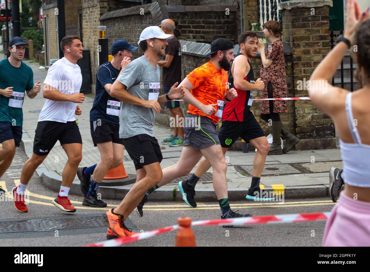 Runners in the Hackney Half 2021, a half marathon though the streets of ...