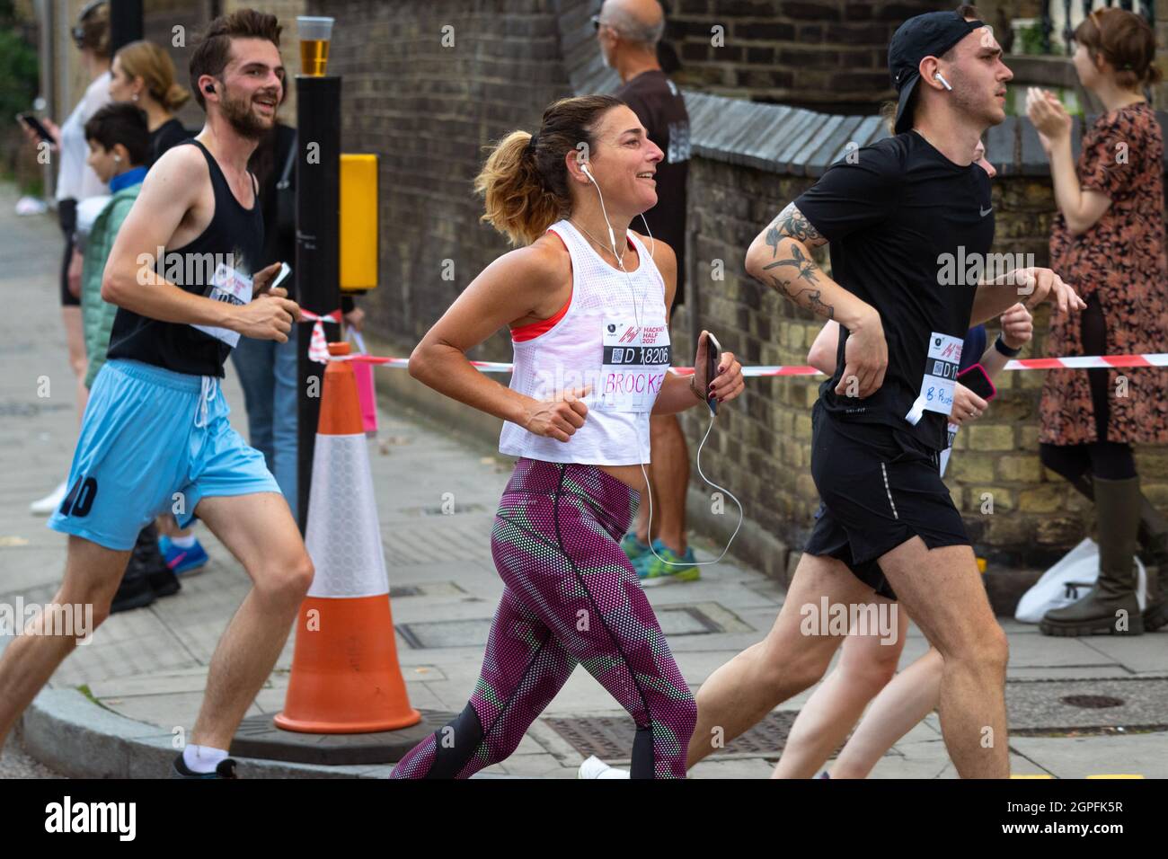 Runners in the Hackney Half 2021, a half marathon though the streets of ...