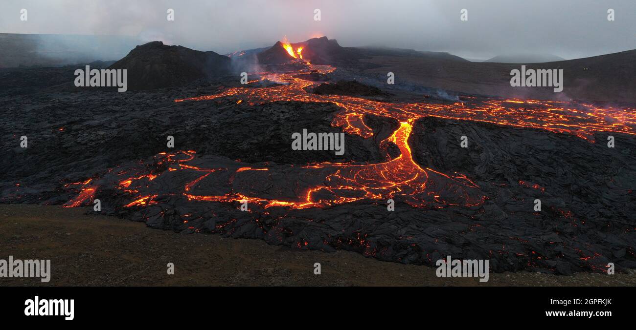 volcano erupting from aerial point of view in panoramic Stock Photo - Alamy