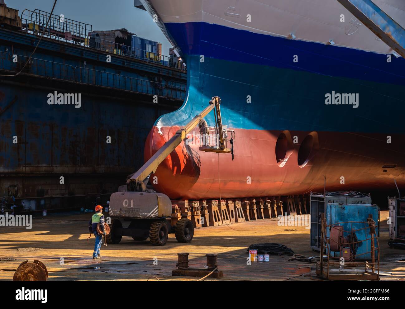 Chernomorsk, Ukraine. 21.03.2021. Painting the bottom of the ship at ...